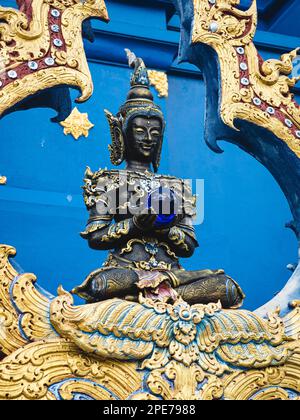 The blue god spirit Buddhist deity at Chiang Rai's Wat Rong Suea Ten ...