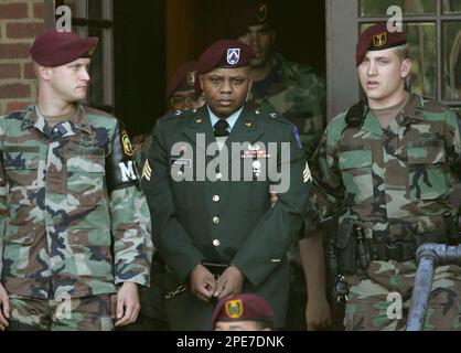 Sgt. Hasan Akbar is led from the Staff Judge Advocate Building at Fort ...