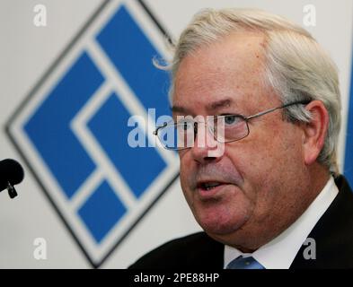 Former director of HIH Insurance Rodney Adler, center, is surrounded by ...