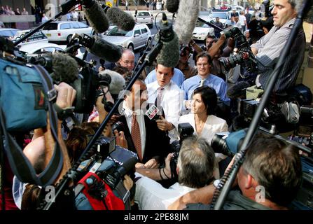 Former director of HIH Insurance Rodney Adler, center, is surrounded by ...