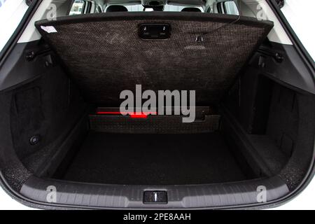 View of the rear storage area in a SUV car. Clean, open empty trunk ...