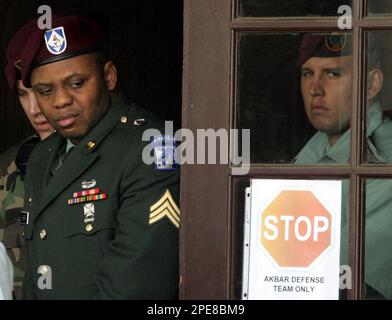 Sgt. Hasan Akbar, center, is led from the Staff Judge Advocate Building ...