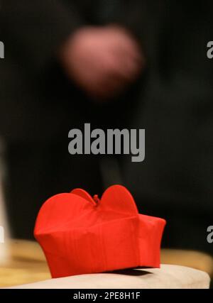 A Cardinal's biretta, the traditional hat worn by Roman Catholic clergy ...