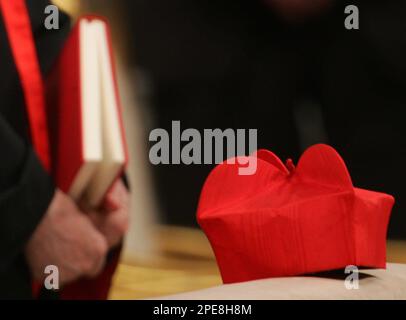 A Cardinal's biretta, the traditional hat worn by Roman Catholic clergy ...