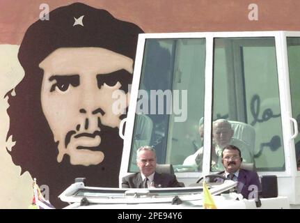 Photo of Ernesto Che Guevara riding his motorized bicycle "La poderosa ...