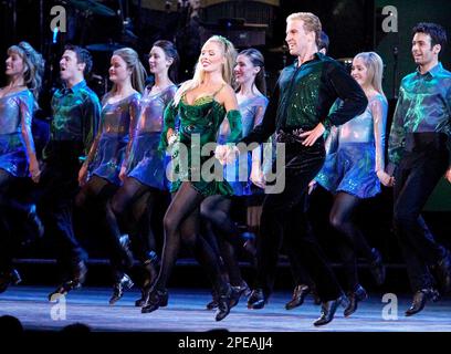 World Champion Irish dancer Sinead McCafferty, center, and members of ...