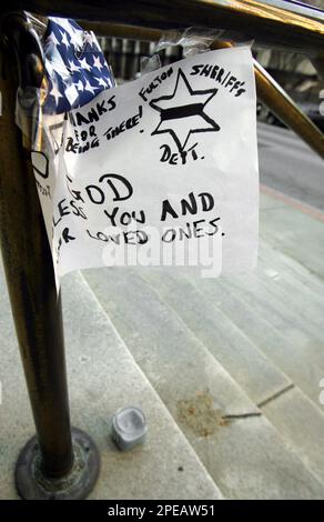 Superior Court Judge Rowland Barnes' widow, Claudia Barnes, left, and ...