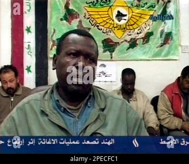 This image taken from Al-Iraqiya television Sunday, Dec. 31, 2006 shows ...