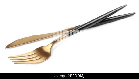 Golden fork and knife with black handles on white background Stock ...