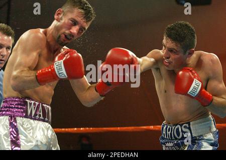 Defending Champion Oscar Larios of Mexico, left, and challenger ...
