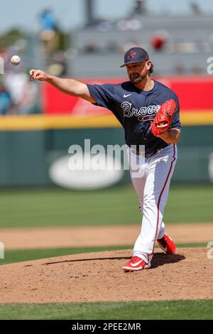 Atlanta Braves relief pitcher Kirby Yates (22) throws to the plate ...