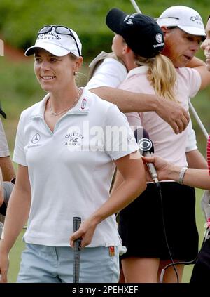 Annika Sorenstam of Sweden walks off the 18th hole after she and Pat ...