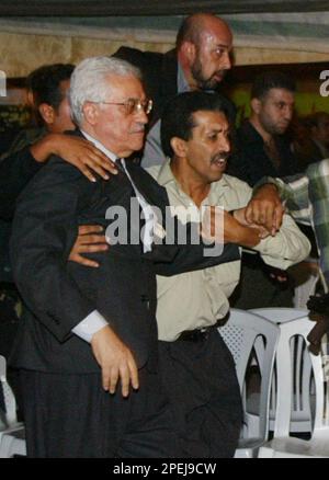 Bodyguards take away Mahmoud Abbas, former Palestinian Prime Minister ...