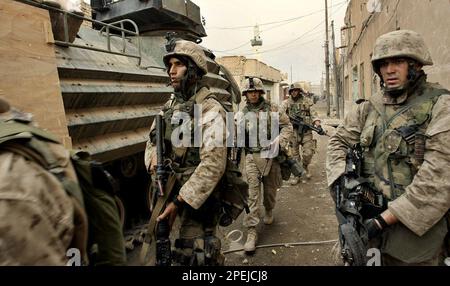 US Marines try to push into the center of Fallujah, Iraq, Friday, Nov ...