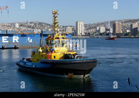 A Powerful Yellow Tug in Valparaiso Harbour in Chile.Tugs are important ...