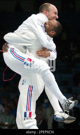 France's fencer Hugues Obry, left, and Hungary's Krisztian Kulcsar in ...
