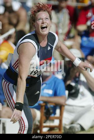 German shot-putter Nadine Kleinert presents her bronze medal which she ...