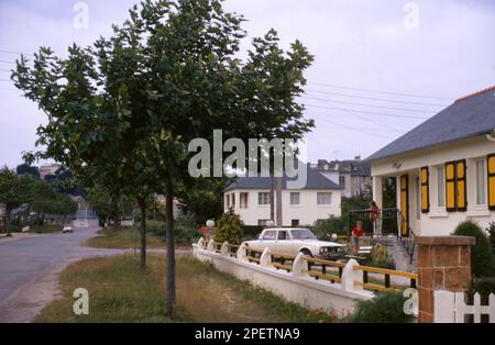 A cream Alfa Romeo 2000 Berlina, a dark blue Citroen Ami 8 and a cream ...