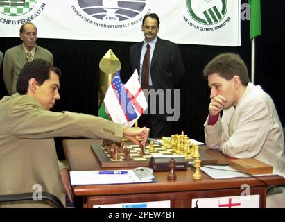 Uzbekistan's Rustam Kasimdzhanov makes a move against England's Michael ...
