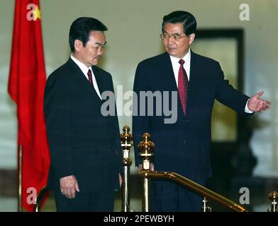 Mongolian President Natsagiyn Bagabandi, left, reviews an honor guard ...