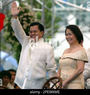 Newly elected Philippine Vice-president Noli de Castro, left, takes his ...