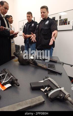 Seattle Police dept. SWAT team members leave in their vehicle from the ...