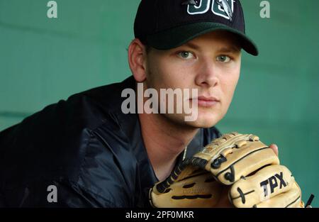 Baseball through broken window Stock Photo - Alamy