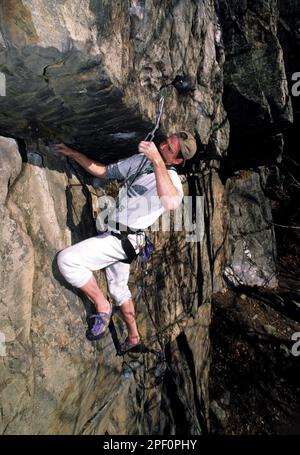 OutdoorSport0/121801 -- Scott Smith gets set up for the "crux" move ...
