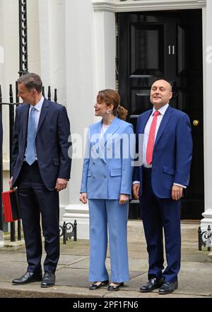 Jeremy Hunt's Treasury team outside 11 Downing Street before his first ...