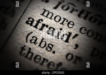 Definition of word afraid on dictionary page, close-up Stock Photo - Alamy
