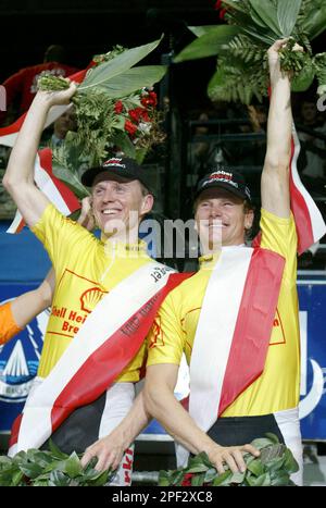 Bruno Risi, right, from Switzerland, embraces Italian Silvio Martinello ...
