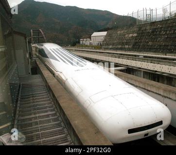 A test model MLX01-901 maglev train runs on the 18.4-kilometer (11.4 ...