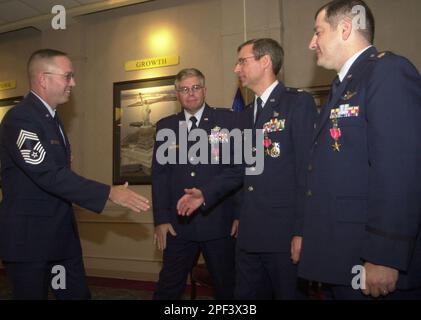 From left, Chief Master Sgt. Nathaniel Perry, U.S. Air Force first ...