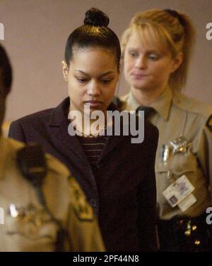 Deidra Lane enters the courtroom at the Mecklenburg County Courthouse ...
