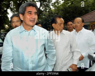 Opposition Senator Gregorio "Gringo" Honasan, right, who has been ...