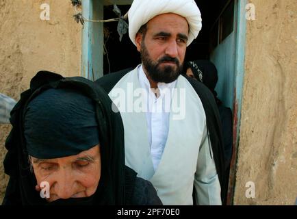 73-year-old Safiya Ahmed Hussain stands near her former home in Dujail ...