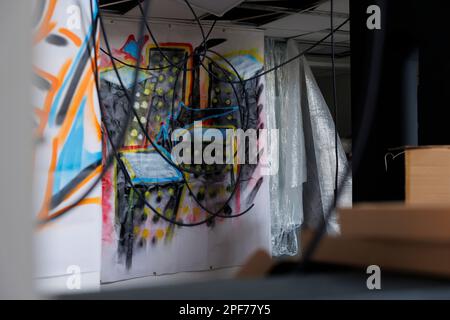 Demolished structure with graffiti and neglected debris, empty deserted ...