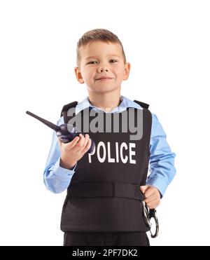 Funny little police officer with radio transmitter on white background ...