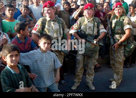 Military police (l-r) Corporal Gwen Hatton, Lance Corporal Tammy ...