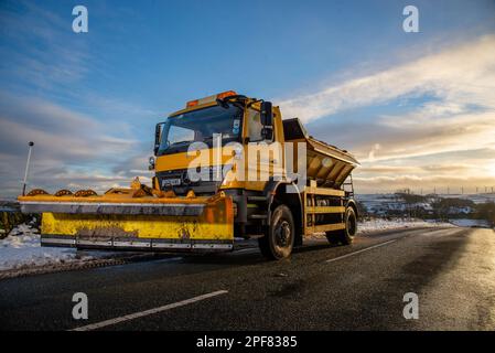 Mercedes Benz Arocs snow plough and gritter truck operating on the ...