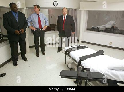 Holman Correctional Facility Warden Grantt Culliver, right, talks with ...