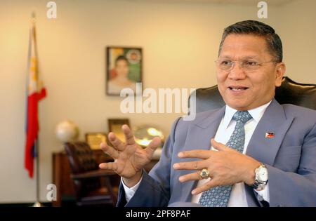 Philippine Defense Secretary Angelo Reyes is interviewed at the ...