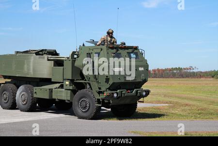 Soldiers with 3-116th Field Artillery (FA) Battalion fire a missile ...