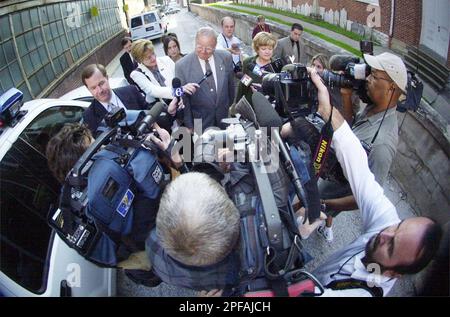 Former mayor of York, Pa., Charlie Robertson, left, stands beside his ...