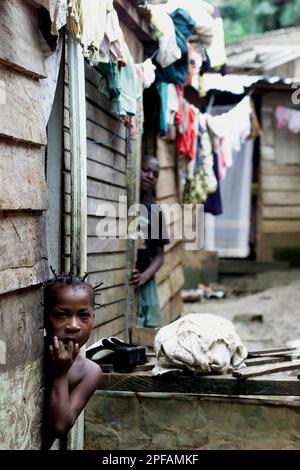 young girl , slum neighbourhood in kuta , bali , indonesia Stock Photo ...