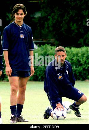 Italian soccer ace Roberto Baggio waves to fans as he wears the jersey ...