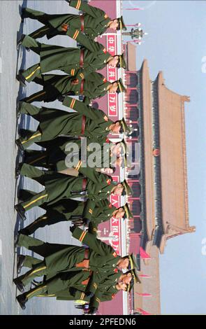 Chinese soldiers march across Beijing's Tiananmen Square Friday, Feb ...