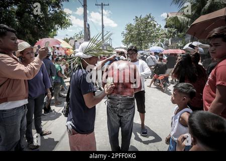 Bleeding flagellant parade in Philippines street for Holy Week and Good ...