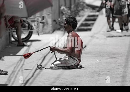 Penitents and bleeding flagellants parade, Holy Week, Good Friday ...