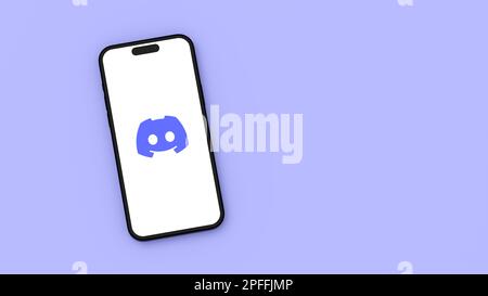 Discord Logo on Mobile Phone Screen on Blue Background with Copy Space ...